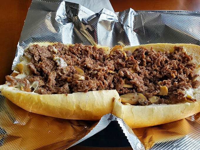 Behold the holy grail of cheesesteaks &ndash; hand-sliced ribeye piled generously on a perfect roll. Philadelphia might want to check its rearview mirror.