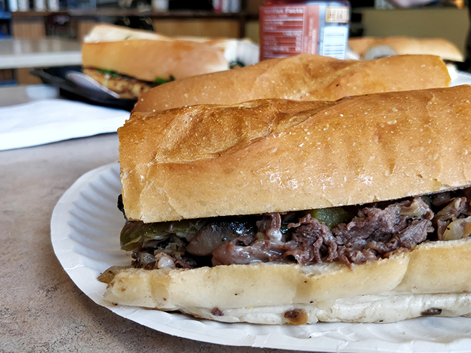 Behold the star of the show &ndash; thinly sliced beef nestled in a perfect roll with melted cheese and peppers. Poetry you can eat.