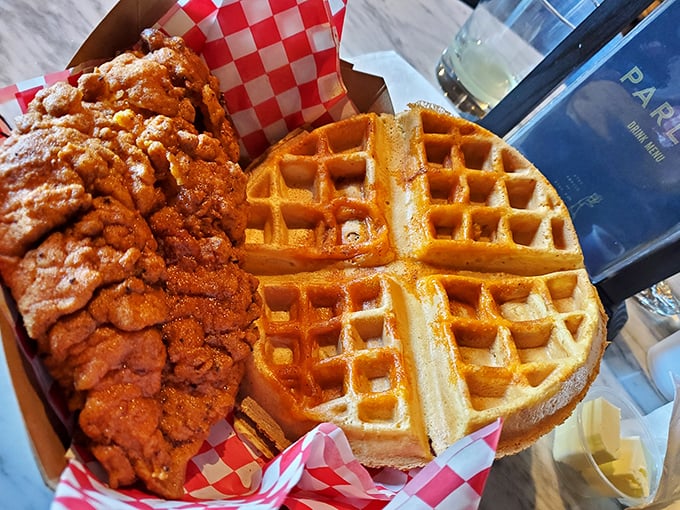Golden-brown chicken meets perfectly gridded waffle &ndash; a relationship more harmonious than Sonny and Cher in their prime.