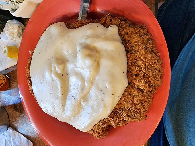 The holy grail of Texas comfort food: a chicken fried steak with crunchy golden breading and cream gravy so good you'll want to write home about it.
