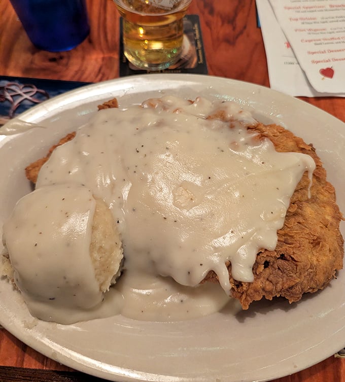 The legendary chicken fried steak in all its glory. That golden crust and pepper-flecked gravy is the kind of dish you'll be thinking about three weeks later.