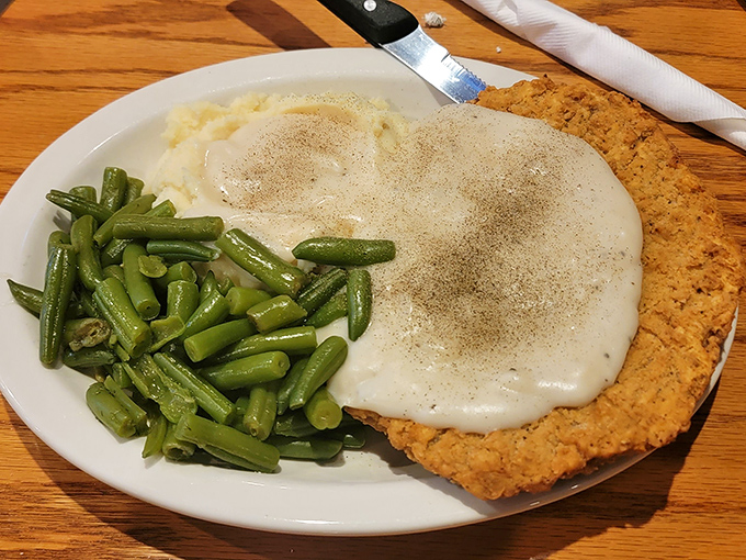 Behold the star of our show: chicken fried steak that's achieved the holy trinity&mdash;crispy exterior, tender interior, and gravy that should be illegal.
