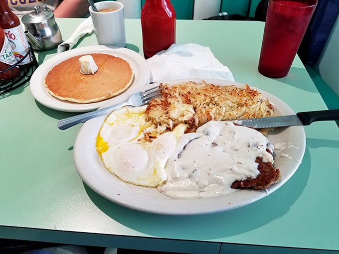Country fried steak with eggs and hash browns &ndash; the breakfast equivalent of a warm hug from your favorite aunt who never counted calories.