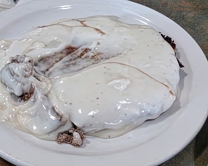 Behold the holy grail&mdash;chicken fried steak swimming in creamy pepper gravy that could make a vegetarian reconsider life choices.