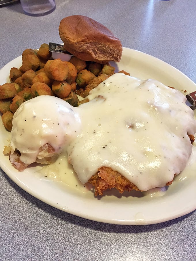 Behold the crown jewel: chicken fried steak smothered in peppery country gravy that could make a vegetarian question their life choices.