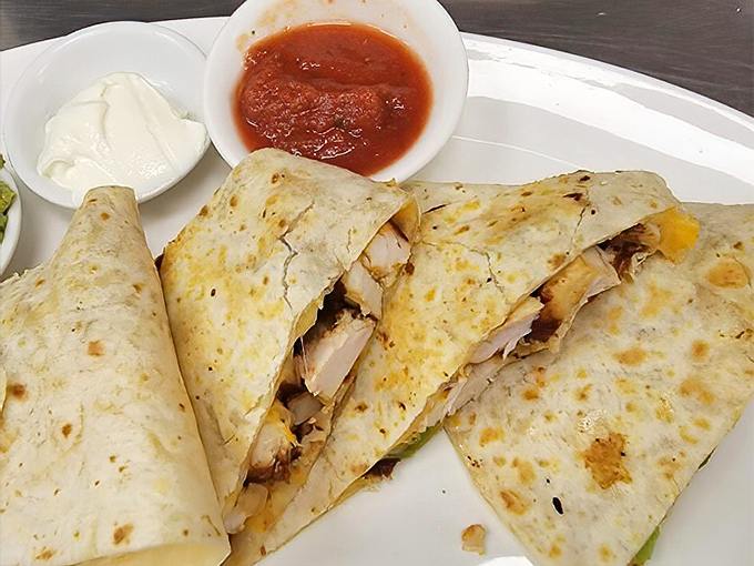 This quesadilla isn't playing games&mdash;packed with tender chicken and melty cheese, it's the comfort food equivalent of a warm hug from your favorite aunt.