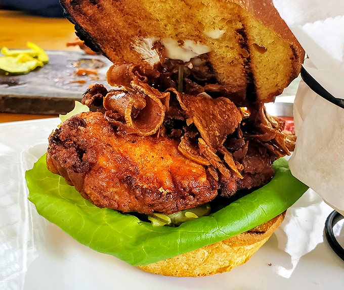 Behold the infamous chicken sandwich&mdash;crispy, juicy, and stacked with toppings that make your standard fast food version look like it needs therapy.