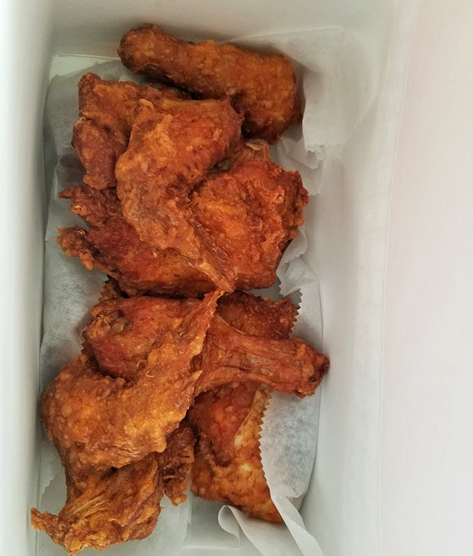 Golden-brown perfection that makes you forget table manners exist. This isn't just fried chicken&mdash;it's edible artwork with a crunch soundtrack.