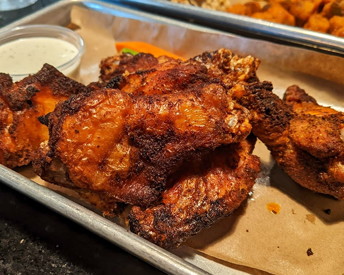 These wings achieve that perfect crispy-outside, juicy-inside alchemy that makes grown adults weep with joy.
