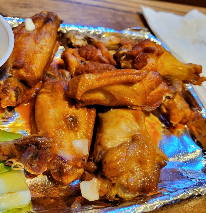 These wings aren't just good, they're life-changing &ndash; glistening with sauce that promises to make your taste buds dance the happy dance.