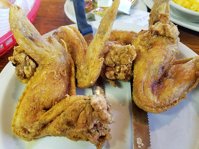 Golden-fried chicken wings that make you question your loyalty to every other wing you've ever loved. Worth every napkin.