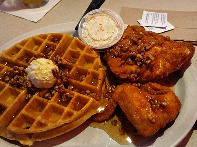 Chicken and waffles: where crispy, golden-brown perfection meets maple-drenched comfort. The pecans are just showing off at this point.