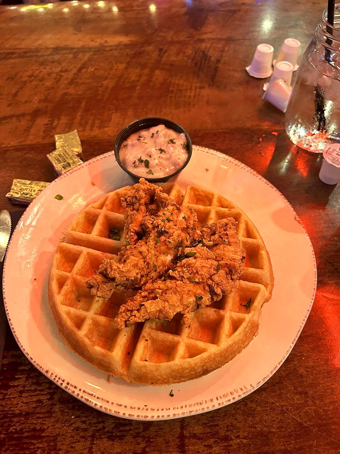 Golden fried chicken perched atop fluffy waffles, because sometimes the best ideas sound crazy at first.