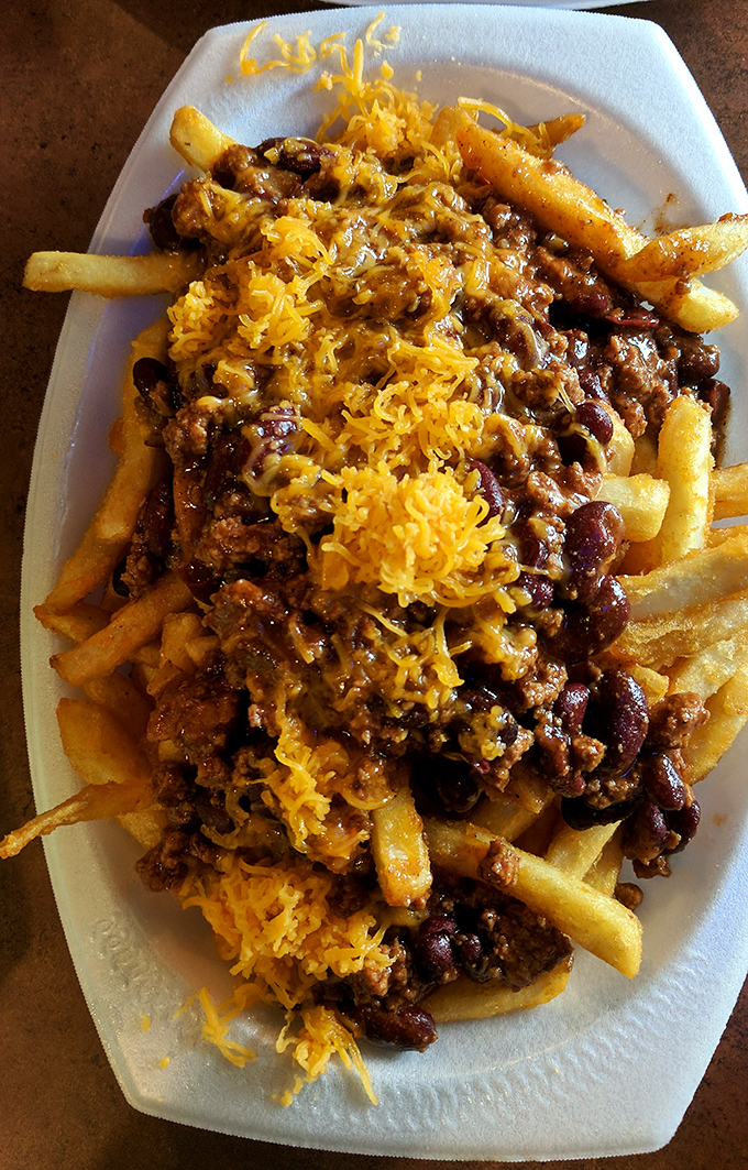 The legendary chili cheese fries&mdash;where crispy potatoes meet hearty chili and melty cheese in a relationship more perfect than any Hollywood romance.
