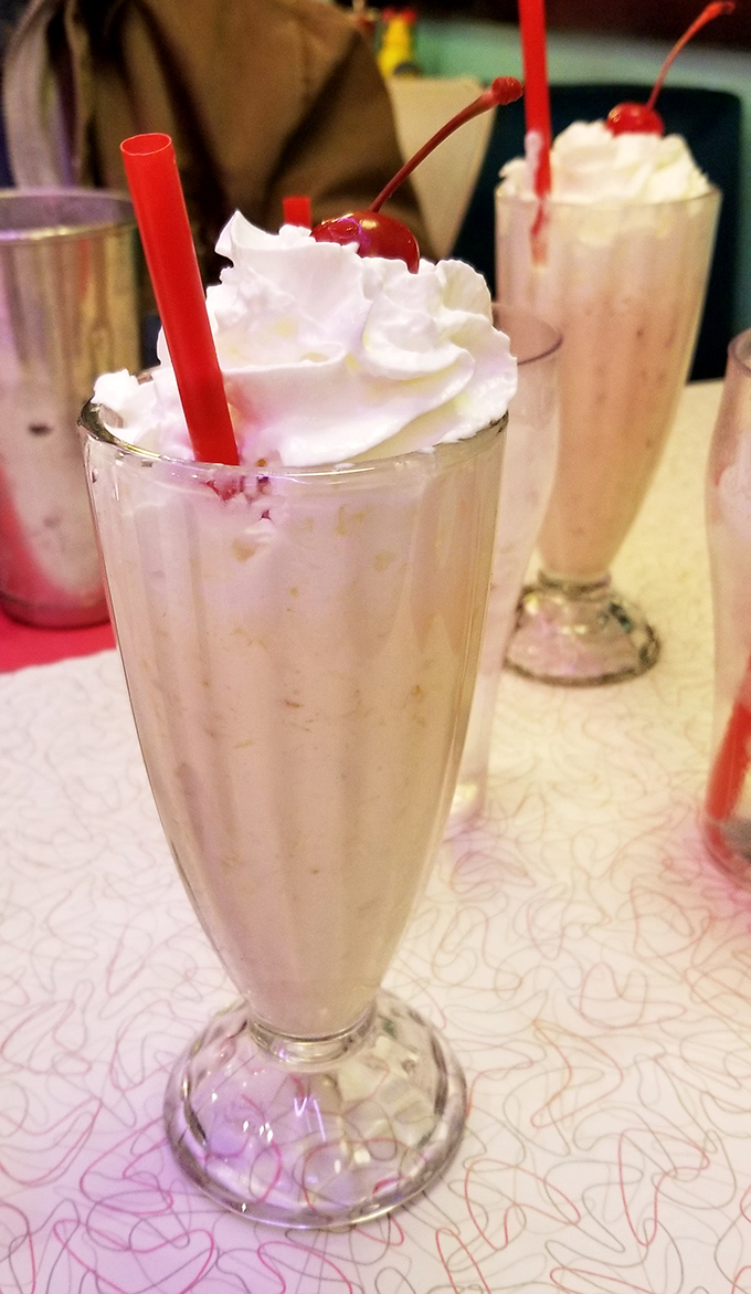 This isn't just a milkshake&mdash;it's architecture in a glass, where whipped cream skyscrapers tower over cherry-topped clouds of creamy perfection.