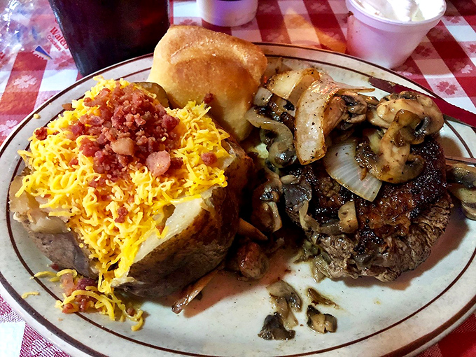 The star of our show: chopped sirloin topped with mushrooms and onions, alongside a loaded baked potato that's dressed for a night out.