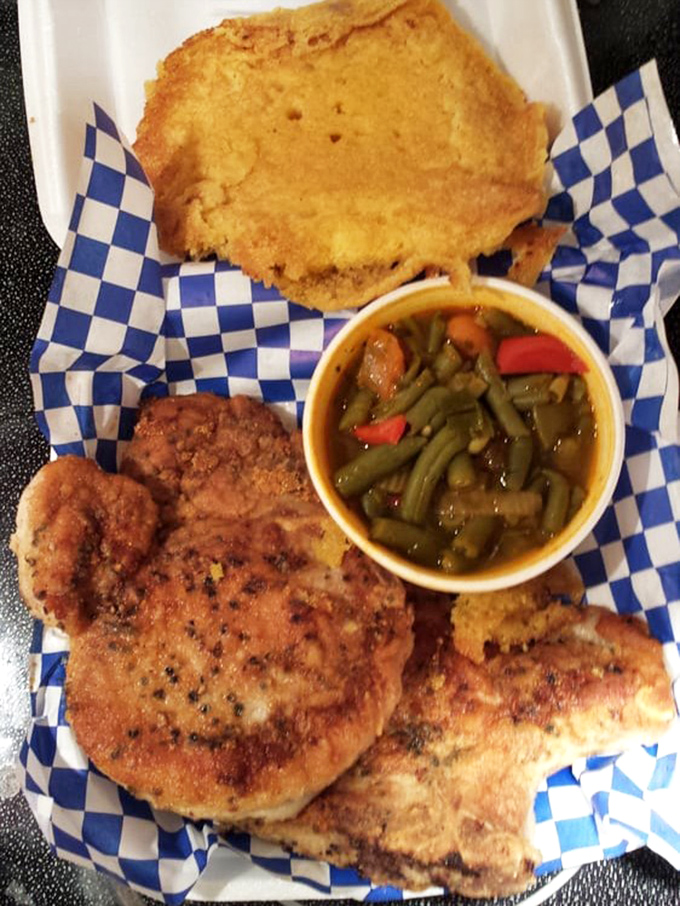 This isn't just a pork chop&mdash;it's a masterclass in soul food perfection, served with cornbread and green beans that would make your grandmother nod in approval.