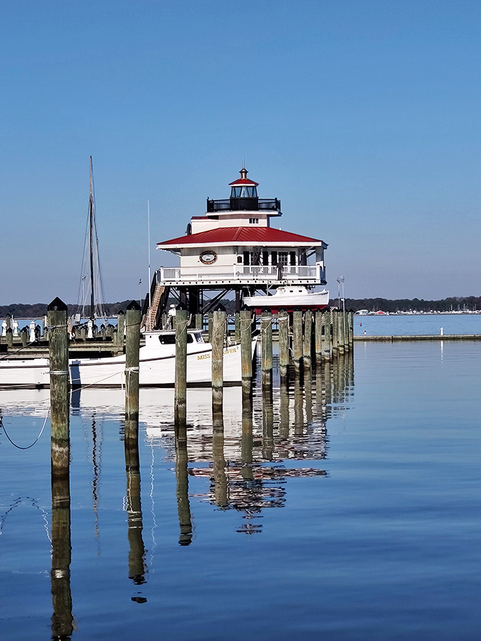 The Choptank River Lighthouse stands sentinel over Cambridge's harbor, reflecting in waters as calm as the town's cost of living.