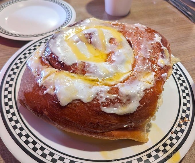 Behold the holy grail of breakfast pastries. This cinnamon roll isn't just food&mdash;it's an event, with glaze cascading down spirals of cinnamon-sugar perfection.
