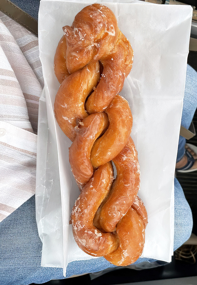 Behold the cinnamon twist in all its glory—a golden, glistening spiral of perfection that makes other breakfast pastries look like mere snacks.