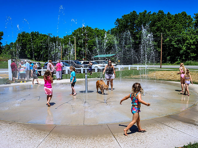 Kids playing in splash pads while parents relax nearby&mdash;this is what summer vacation was meant to be.