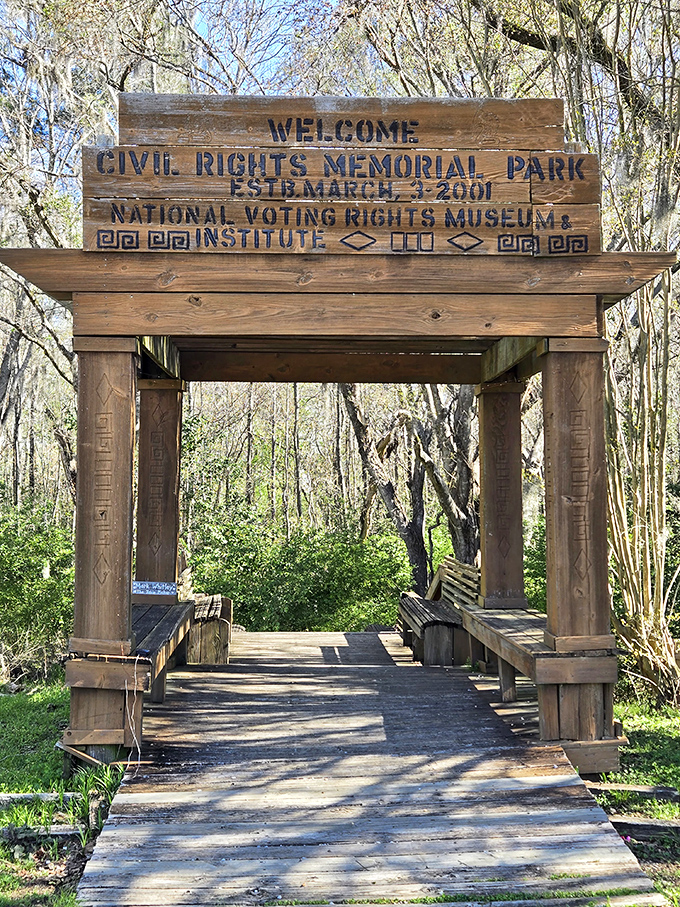 This wooden gateway to the Civil Rights Memorial Park invites reflection on the struggles and triumphs that forever changed America.