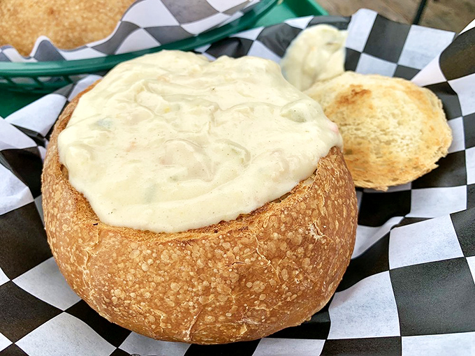 Clam chowder served in a sourdough bread bowl &ndash; nature's perfect dishware meets the Pacific Ocean's creamiest creation. Spoons up, phones down.