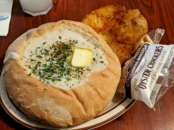Bread bowl nirvana! This steaming clam chowder fortress surrounded by sourdough walls might just be the eighth wonder of the culinary world.