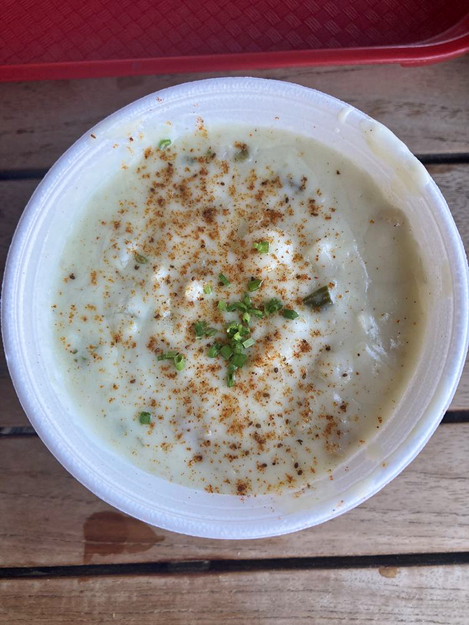 Behold the legendary clam chowder in all its creamy glory. Those flecks of herbs and spice aren't just garnish &ndash; they're little flavor messengers from Neptune himself.