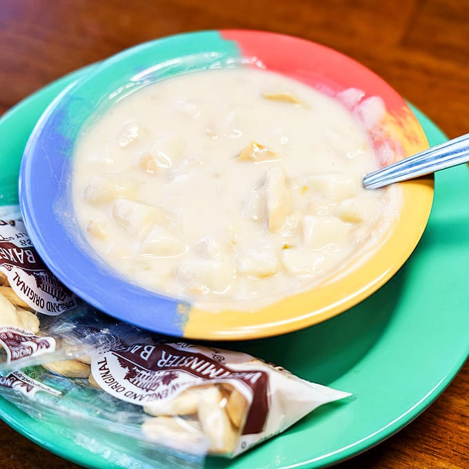 Behold, the legendary clam chowder in its colorful ceramic throne. This creamy concoction has inspired more Ohio road trips than fall foliage.