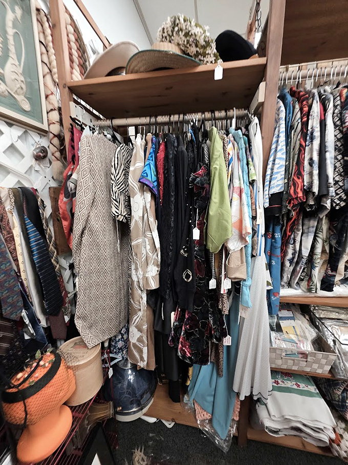 Vintage clothing that whispers tales of glamorous nights and bygone fashion. Each garment hanging here once danced through someone else's memories.
