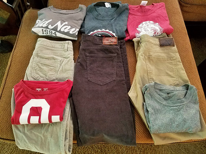 Perfectly folded fashion finds await their second chance&mdash;Old Navy meets new owner in this colorful clothing display.