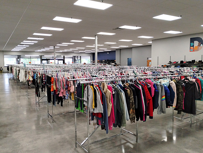 The clothing forest stretches to the horizon. Each rack a different chapter in the never-ending story of "What Will I Find Today?"
