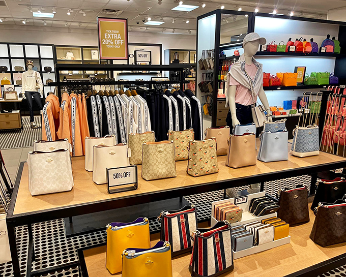 Designer heaven awaits at the Coach outlet, where handbags stand at attention like soldiers in a very fashionable, very tempting army.