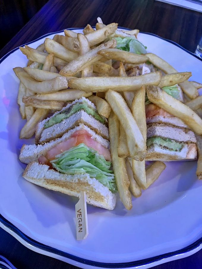 The club sandwich arrives like architecture on a plate&mdash;perfectly toasted bread, real turkey, and enough bacon to make any day better.