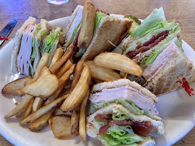 This club sandwich doesn't just have layers, it has stories to tell. Those golden fries aren't merely side characters&mdash;they're co-stars in this lunchtime drama.