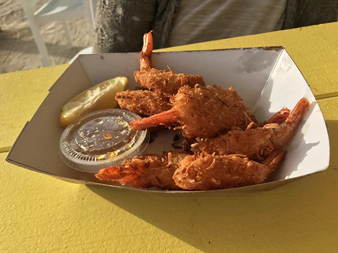 Golden coconut shrimp that crunch like your favorite beach read&mdash;impossible to put down until you've finished every last one.