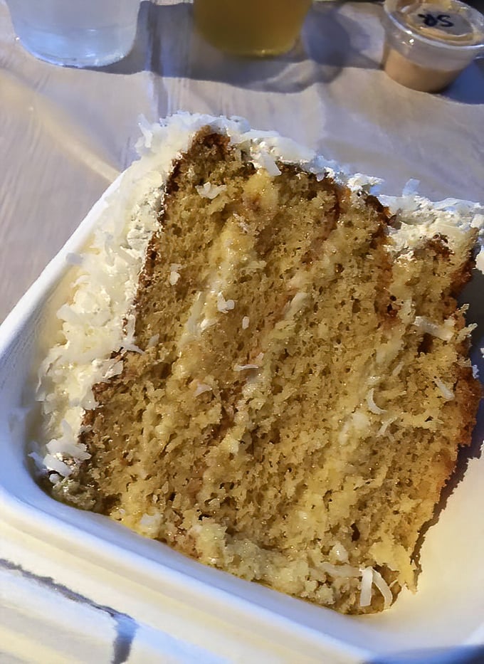 Layer upon heavenly layer of coconut perfection. This isn't just cake &ndash; it's the reason people drive miles out of their way.