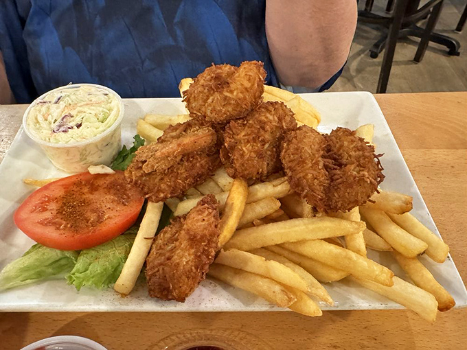 Golden-brown coconut shrimp that look like they're auditioning for a Food Network glamour shot – and definitely getting a callback.