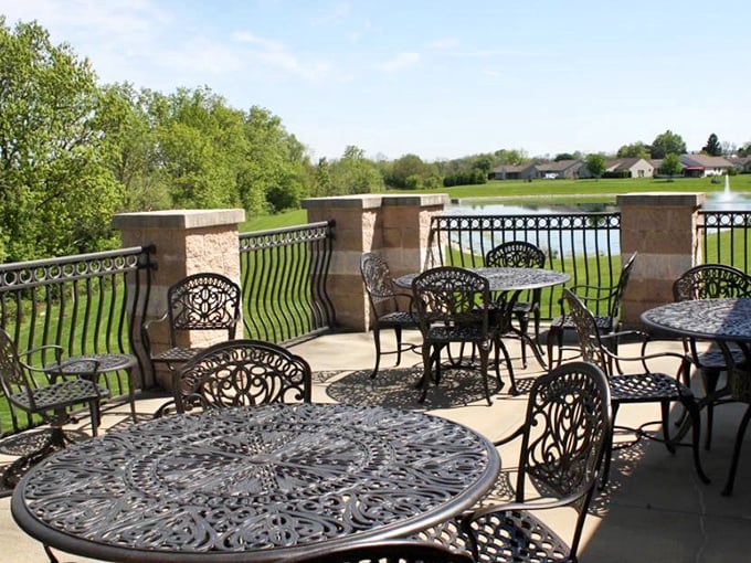 Wrought iron elegance meets panoramic pond views. The perfect spot for morning coffee or evening contemplation &ndash; no reservation required.