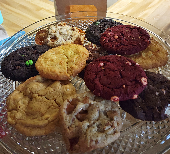 Cookie nirvana achieved: chocolate, red velvet, and classic favorites arranged like edible jewels on a crystal platter.