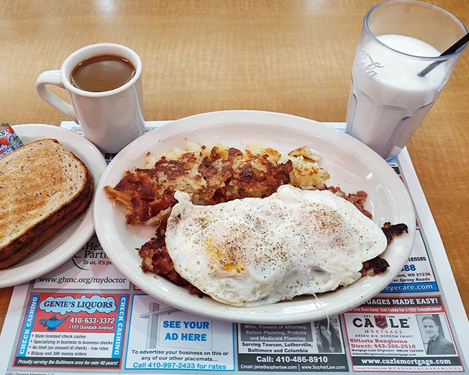 Corned beef hash with eggs sunny-side up &ndash; the breakfast equivalent of finding an extra $20 in your winter coat pocket. Pure, unexpected joy. 