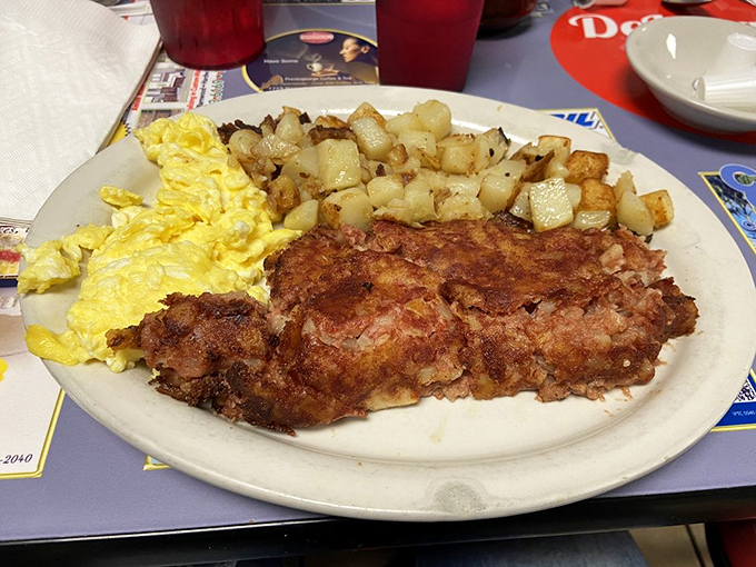 Behold the legendary corned beef hash&mdash;crispy-edged, tender-centered, and paired with eggs that could make a rooster proud.