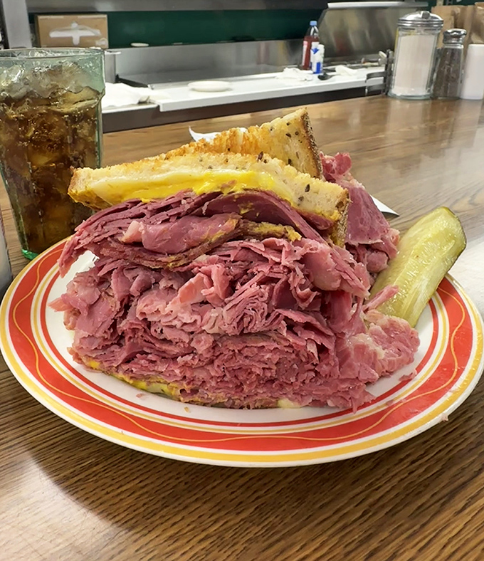 Behold: a corned beef sandwich that requires engineering skills and both hands to navigate successfully through lunch.
