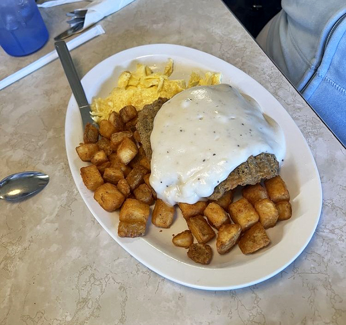 The star of the show: country fried steak swimming in peppery gravy alongside golden potatoes and eggs&mdash;a breakfast that could fuel a farmhand for days.