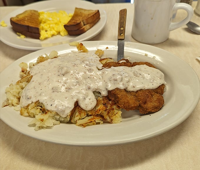 Country fried steak smothered in pepper gravy&mdash;comfort food's answer to a warm hug. Cardiologists might wince, but your soul will thank you. 