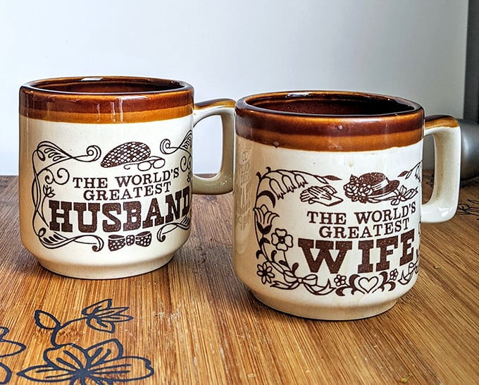 "World's Greatest" mugs that survived countless morning coffees and dishwasher cycles to find new homes. Relationship goals in ceramic form!