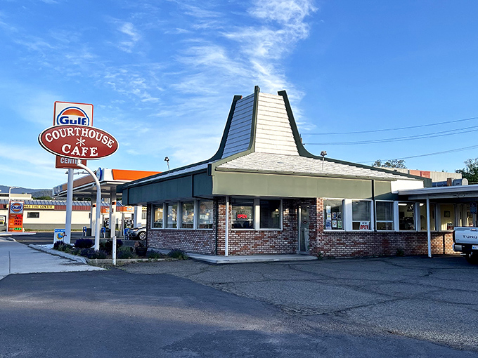 The Courthouse Caf&eacute;'s distinctive peaked roof and vintage Gulf sign promise the kind of hearty breakfast that fuels mountain adventures and nostalgic conversations.