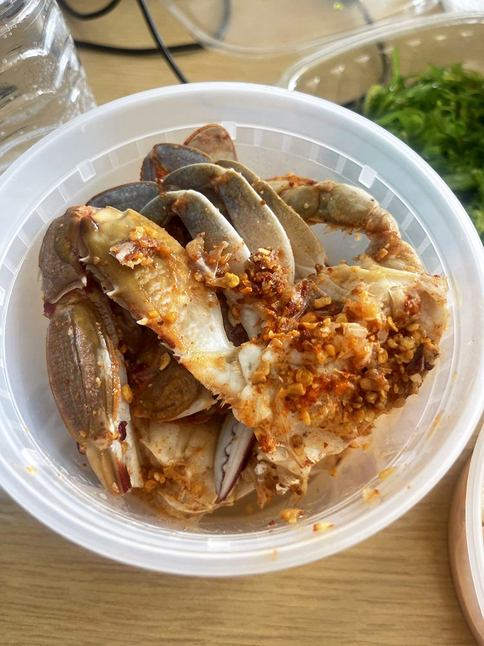 This isn't just crab; it's an edible puzzle of oceanic delight. Sweet meat hiding in shell segments, waiting to reward the patient.