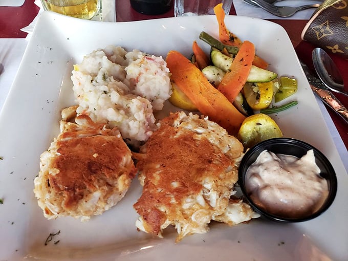 These aren't just crab cakes; they're edible time machines to when seafood was actually about the seafood. Minimal filler, maximum flavor.